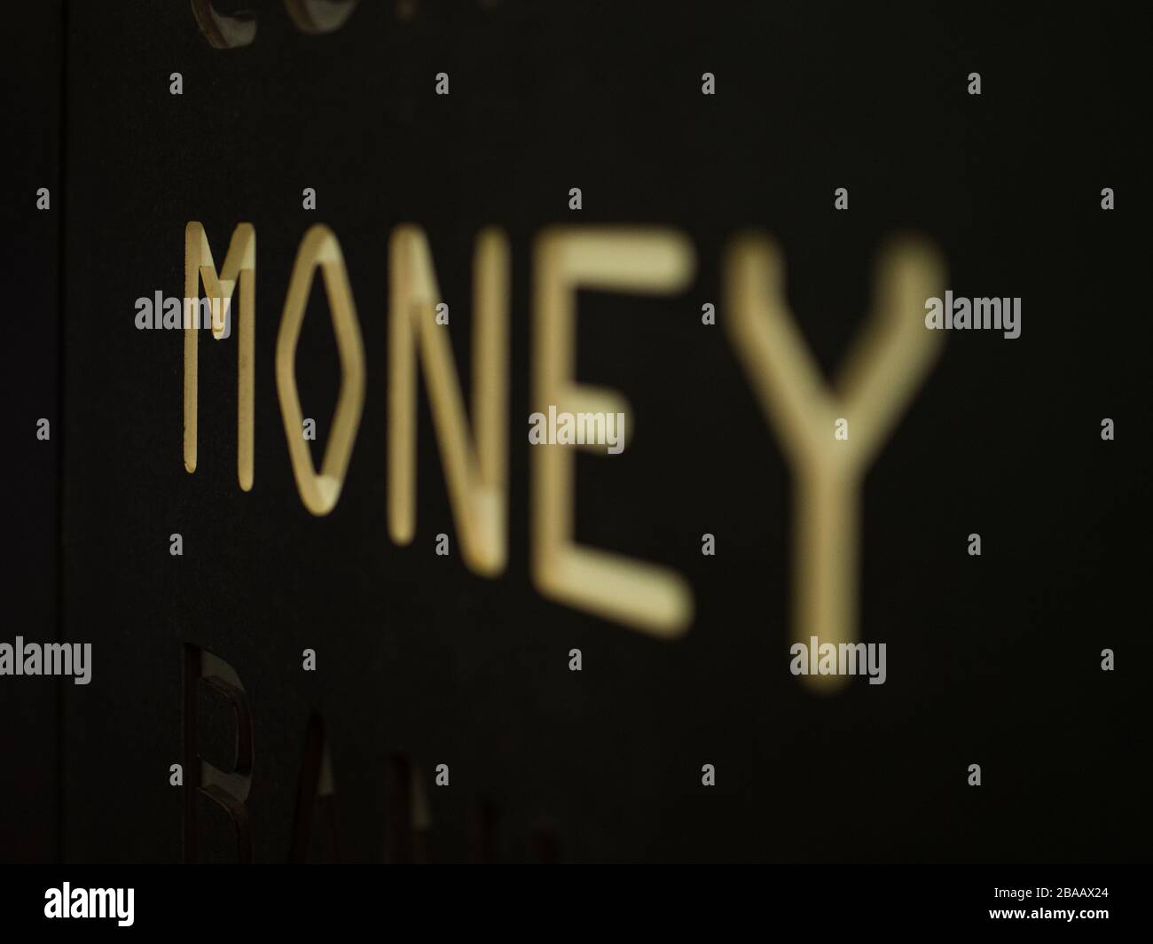 blurry money word on black background Stock Photo - Alamy