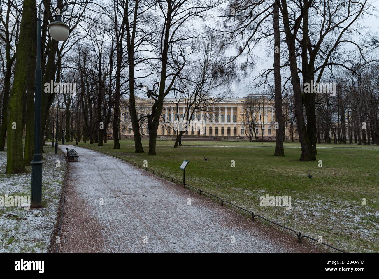 Alley in Mikhailovsky garden at winter with Russian Museum at ...