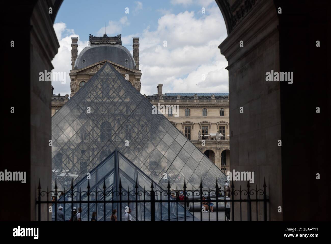 Inside the Louvre looking out to the glass pyramid Stock Photo - Alamy