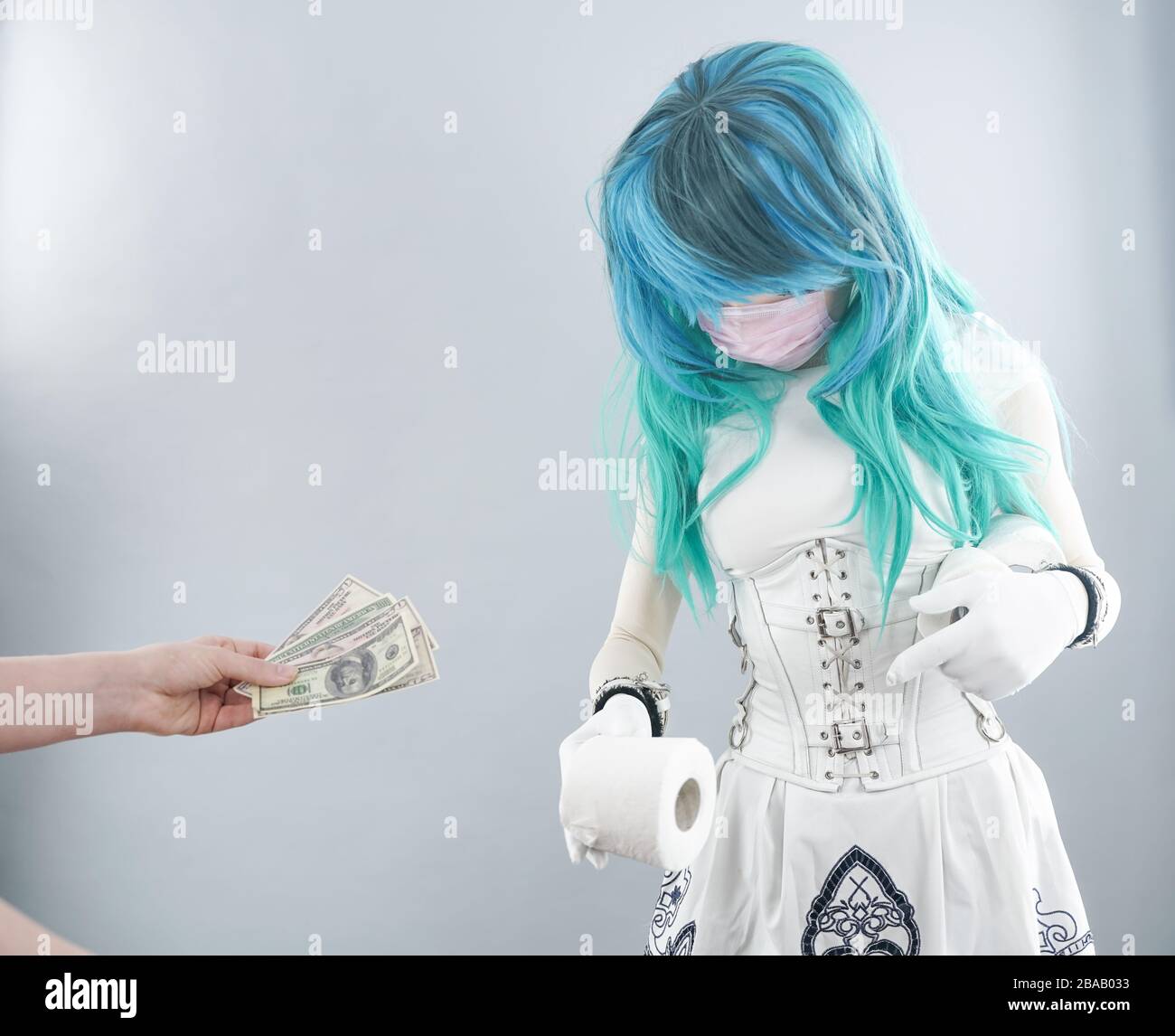 A woman is wearing a face mask for protection from the Corona Virus and ...