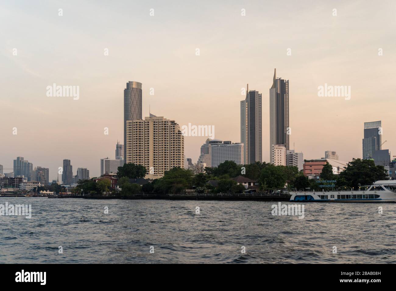 Bangkok cityscape view with Chao Phraya River and beautiful sunset sky ...