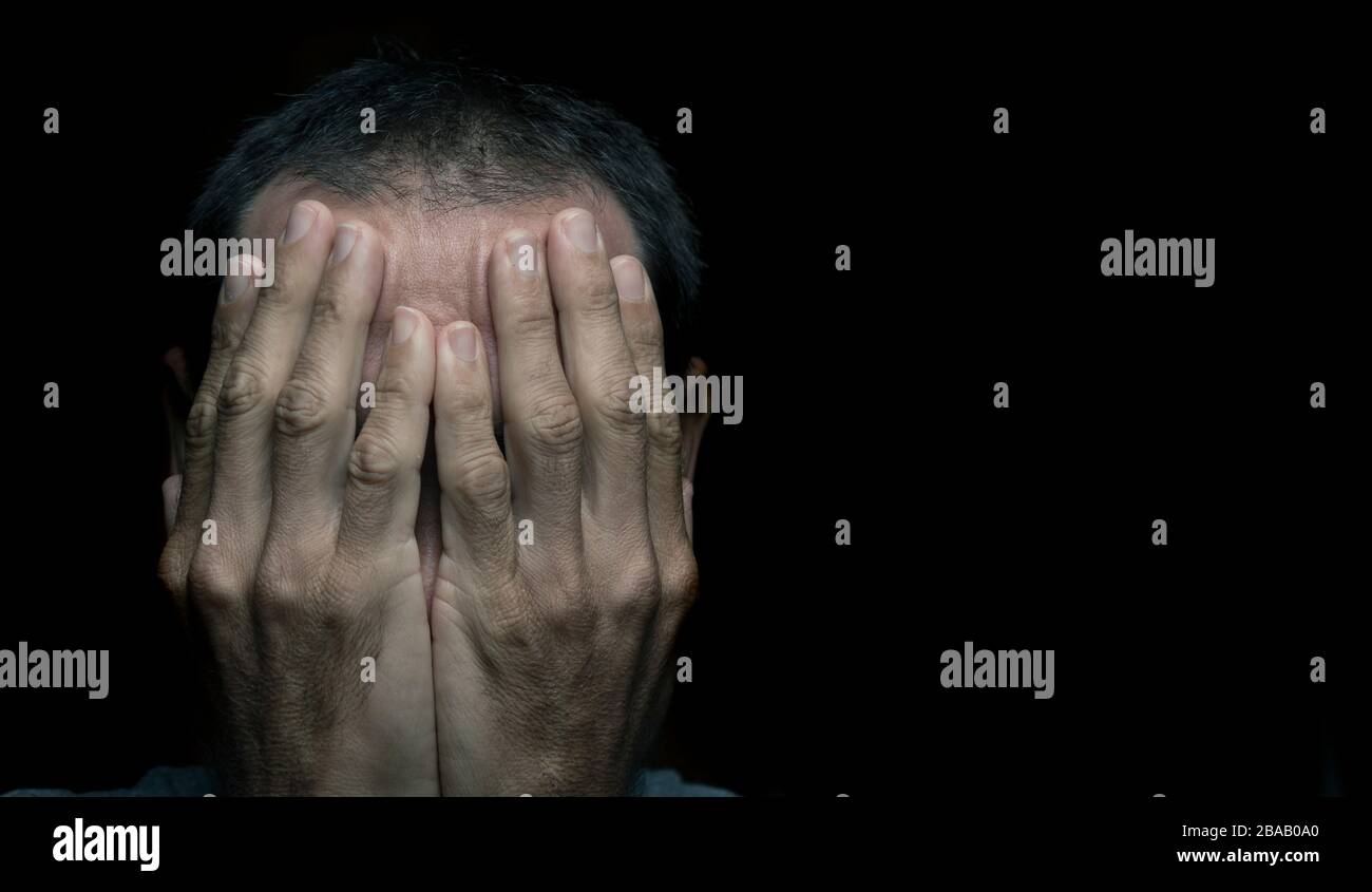 Man crying head in hands hi-res stock photography and images - Alamy