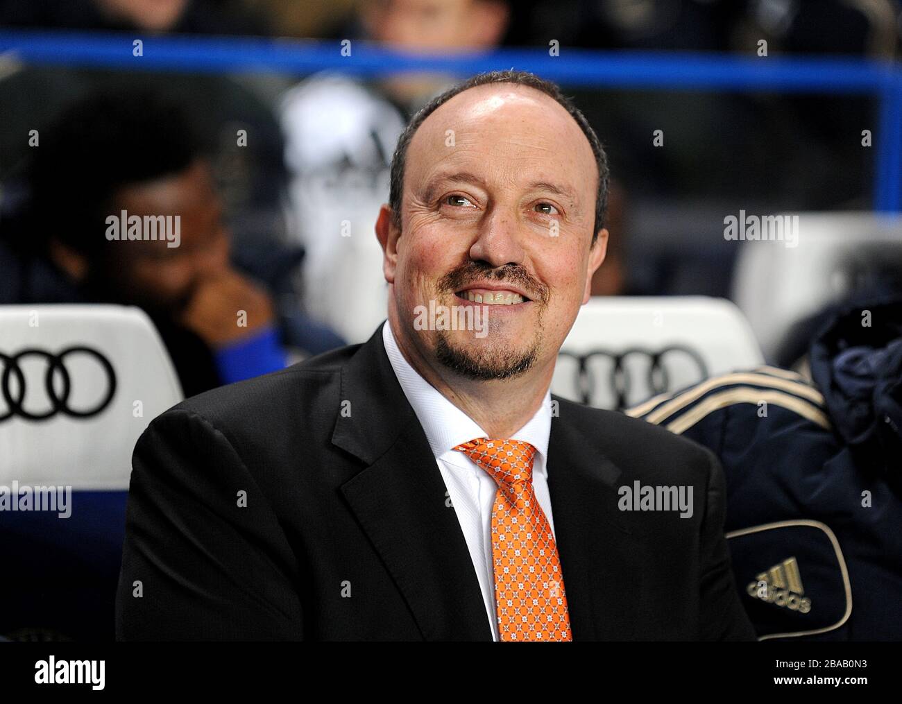 Chelsea manager Rafael Benitez takes his seat on the bench before kick ...