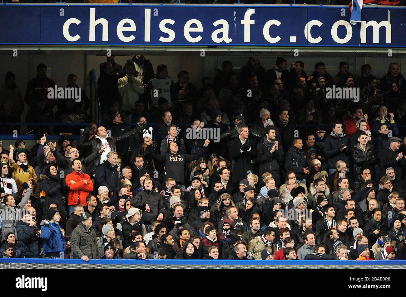 Fulham fans show their passion in the stands Stock Photo - Alamy