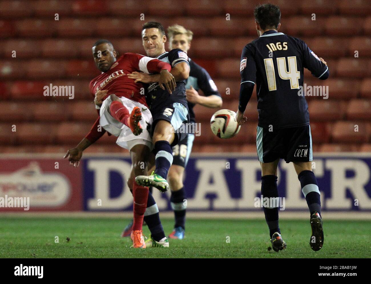 Barnsleys emile sinclair left in action with burnleys jason shackell hi ...