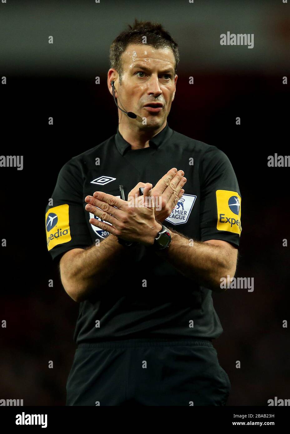Football referee in action hi-res stock photography and images - Alamy