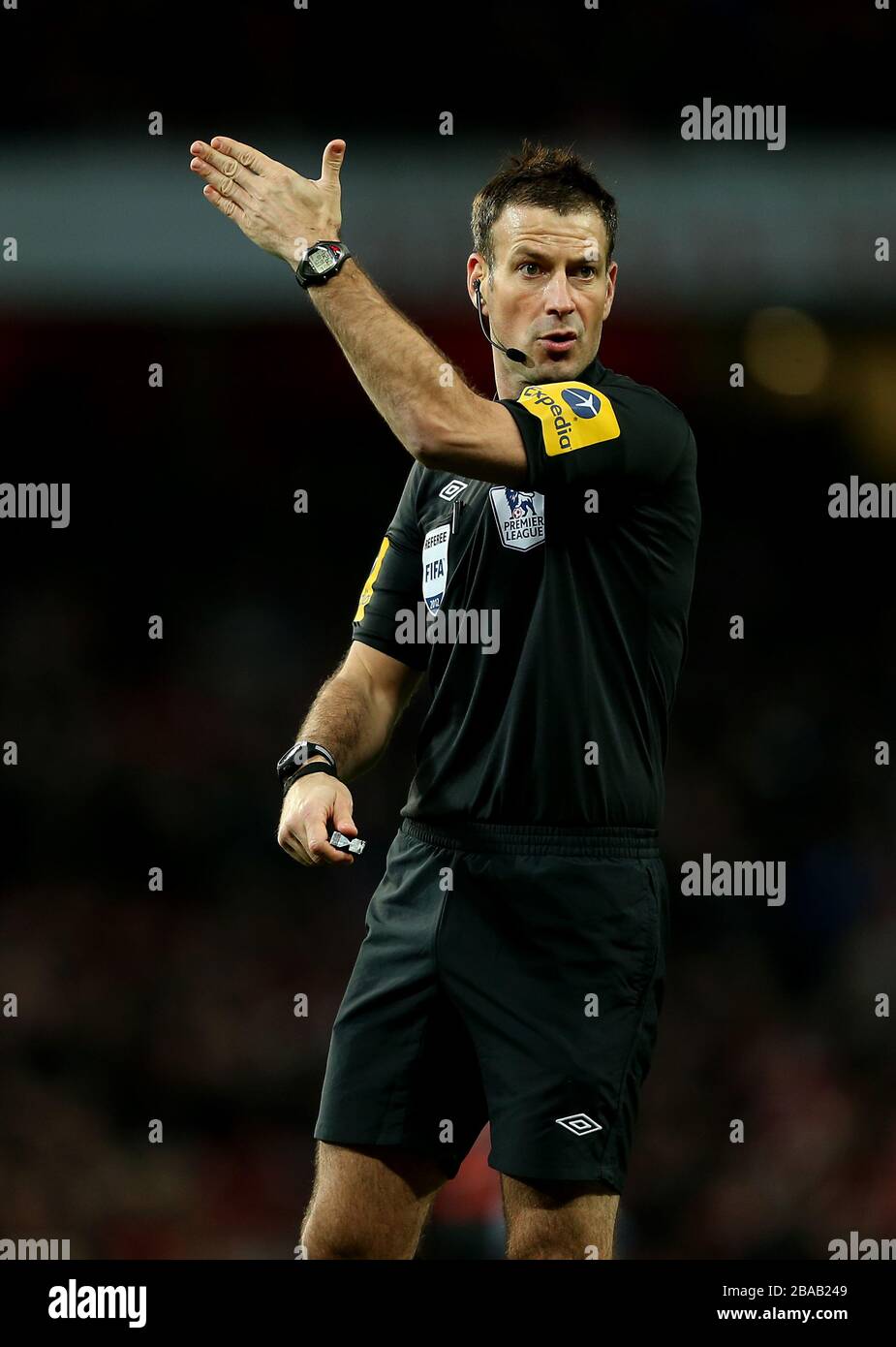 Football referee in action hi-res stock photography and images - Alamy