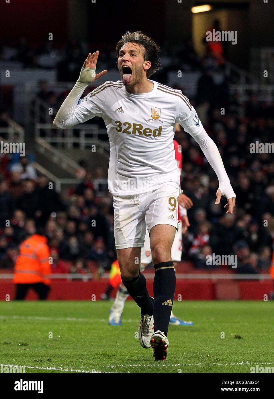 Swansea City's Miguel Michu celebrates scoring his sides first goal ...