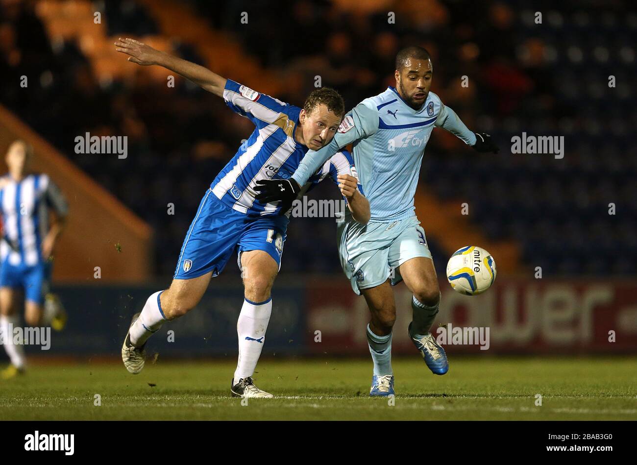 Colchester United's Tom Eastman and Coventry City's David McGoldrick ...