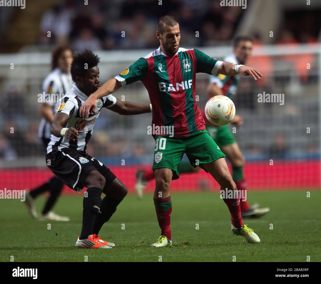 Newcastle United's Gael Bigirimana and Maritimo's David Simao battle ...