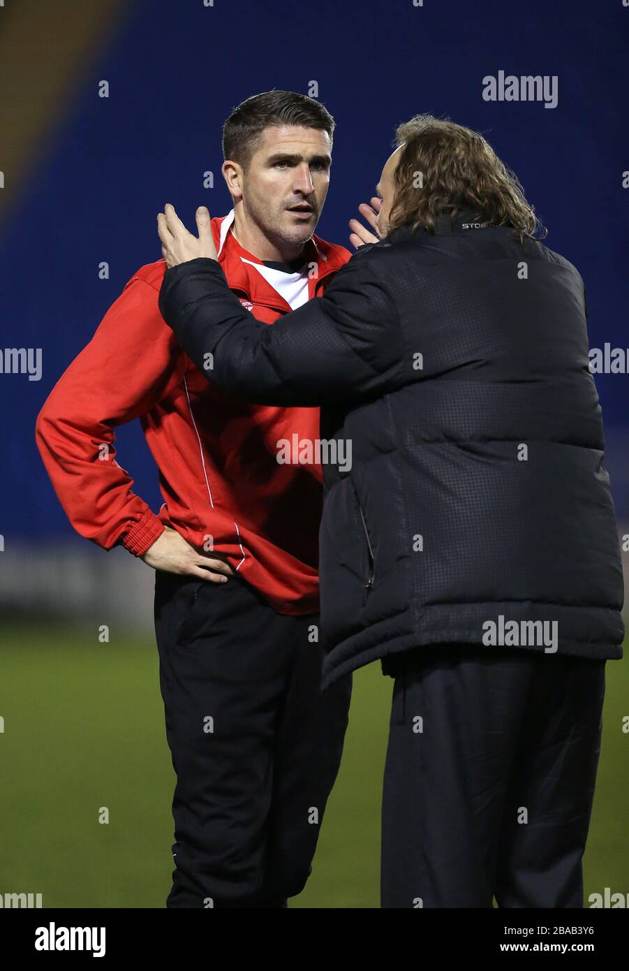 Milton Keynes Dons Ryan Lowe (left) speaks with chairman Pete Winkleman ...