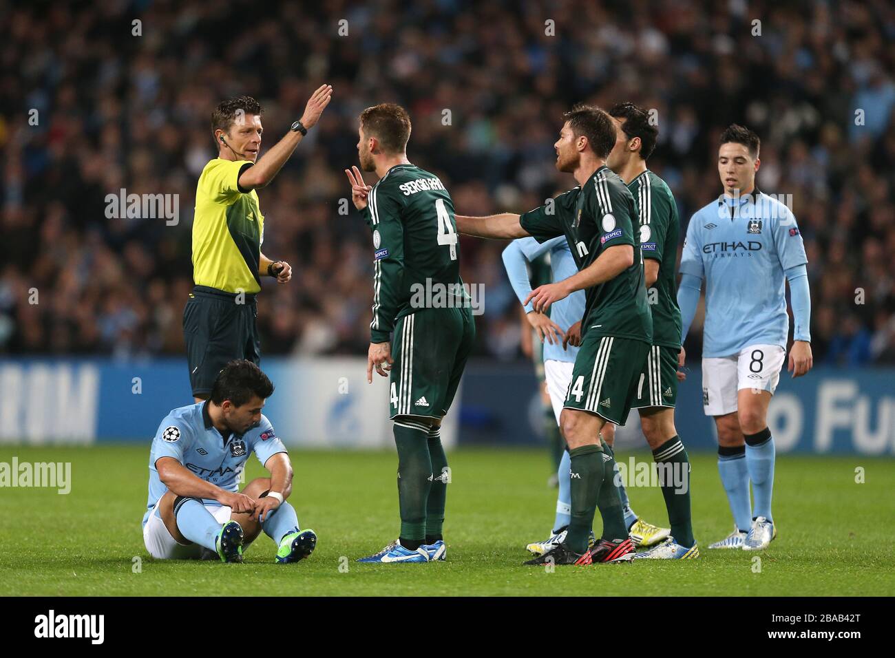 Real Madrid's Sergio Ramos argues with referee Gianluca Rocchi (left ...