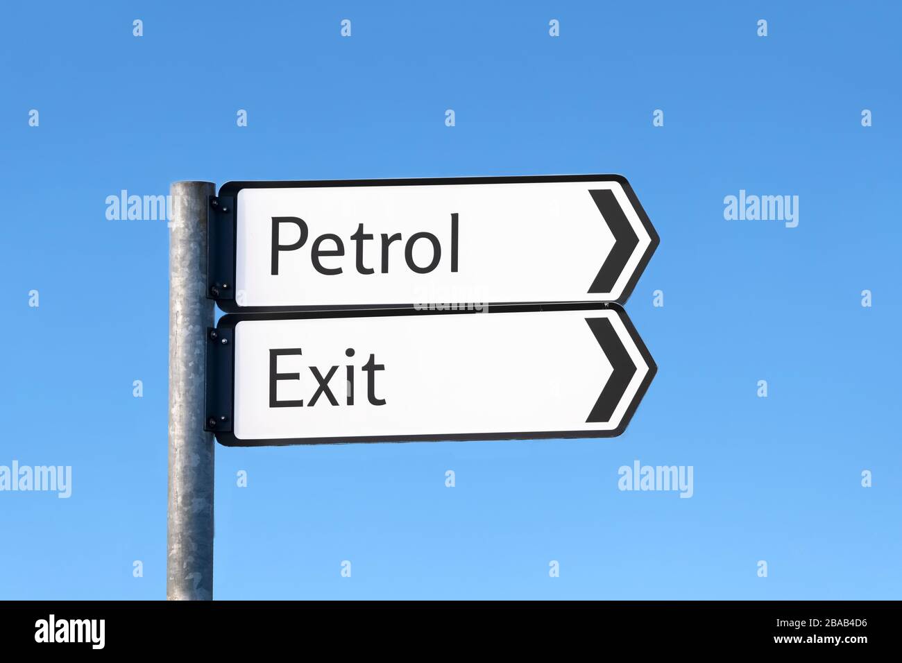 Petrol delivery exit direction arrow sign Stock Photo - Alamy