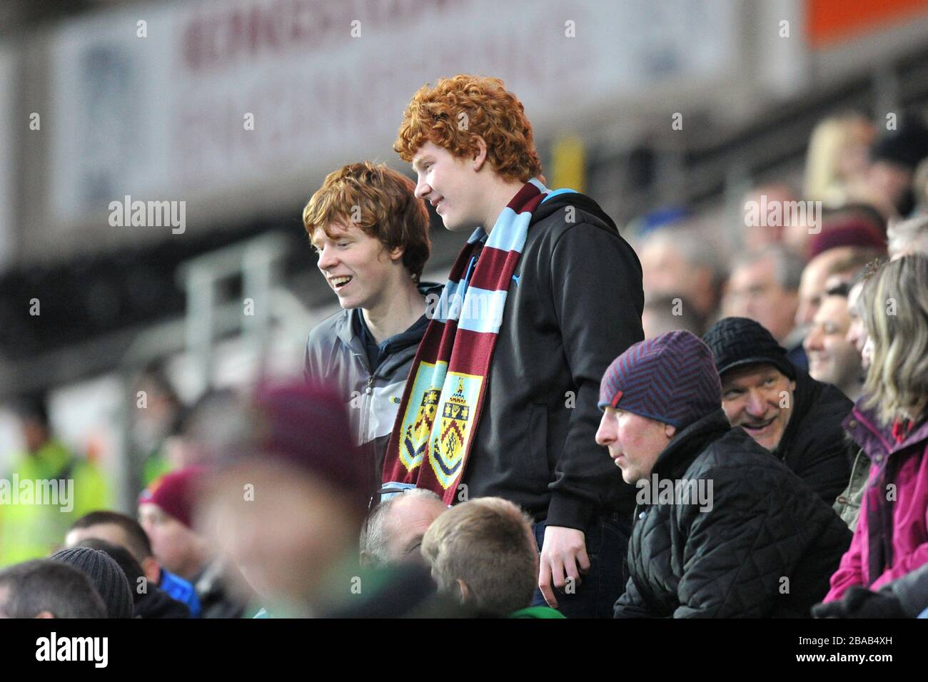 Burnley fans in the stands Stock Photo - Alamy
