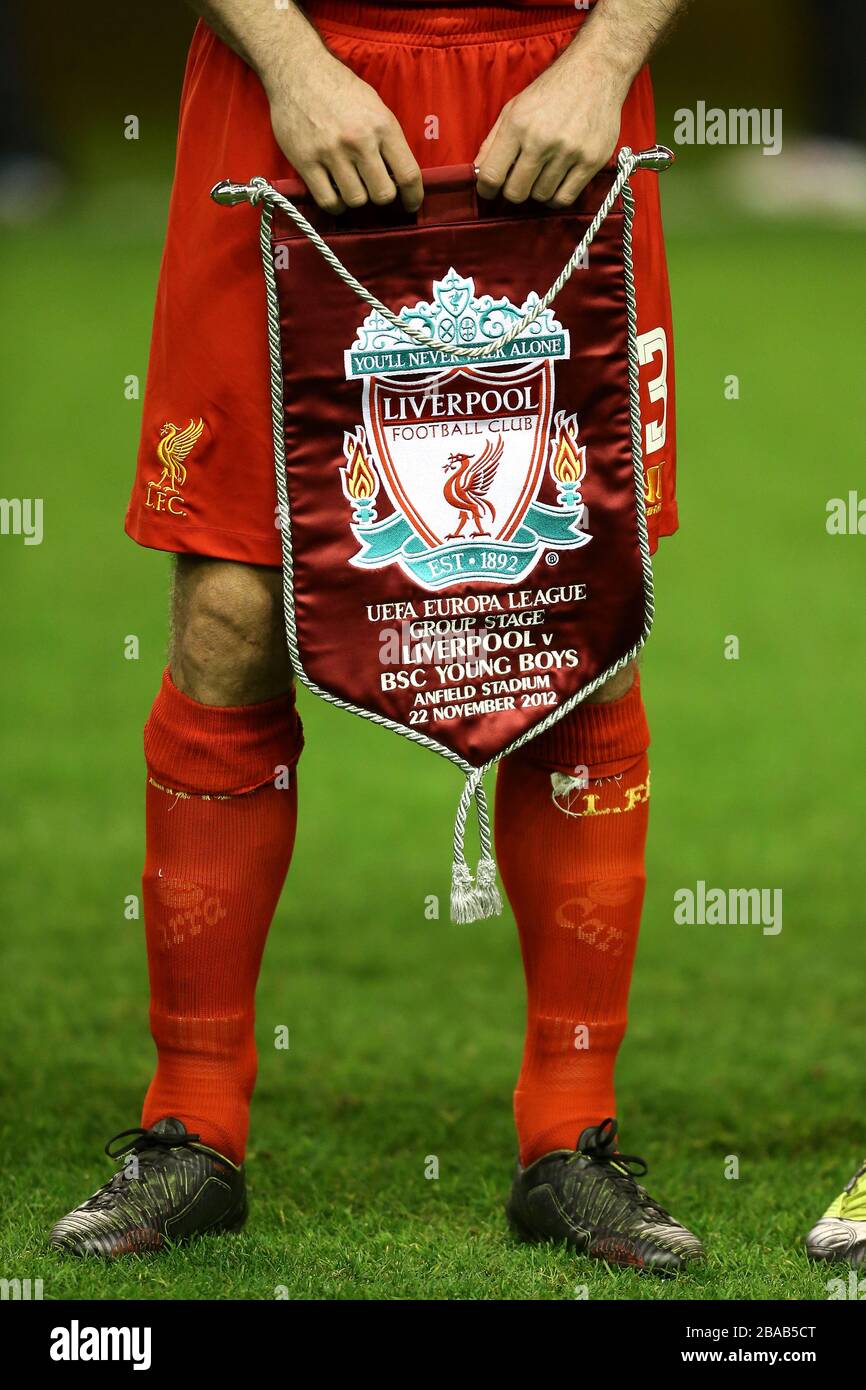 Liverpool captain Jamie Carragher holds the match pennant Stock Photo ...