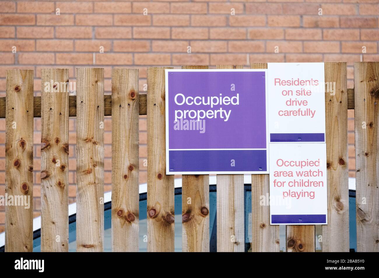 Building site occupied property sign Stock Photo - Alamy