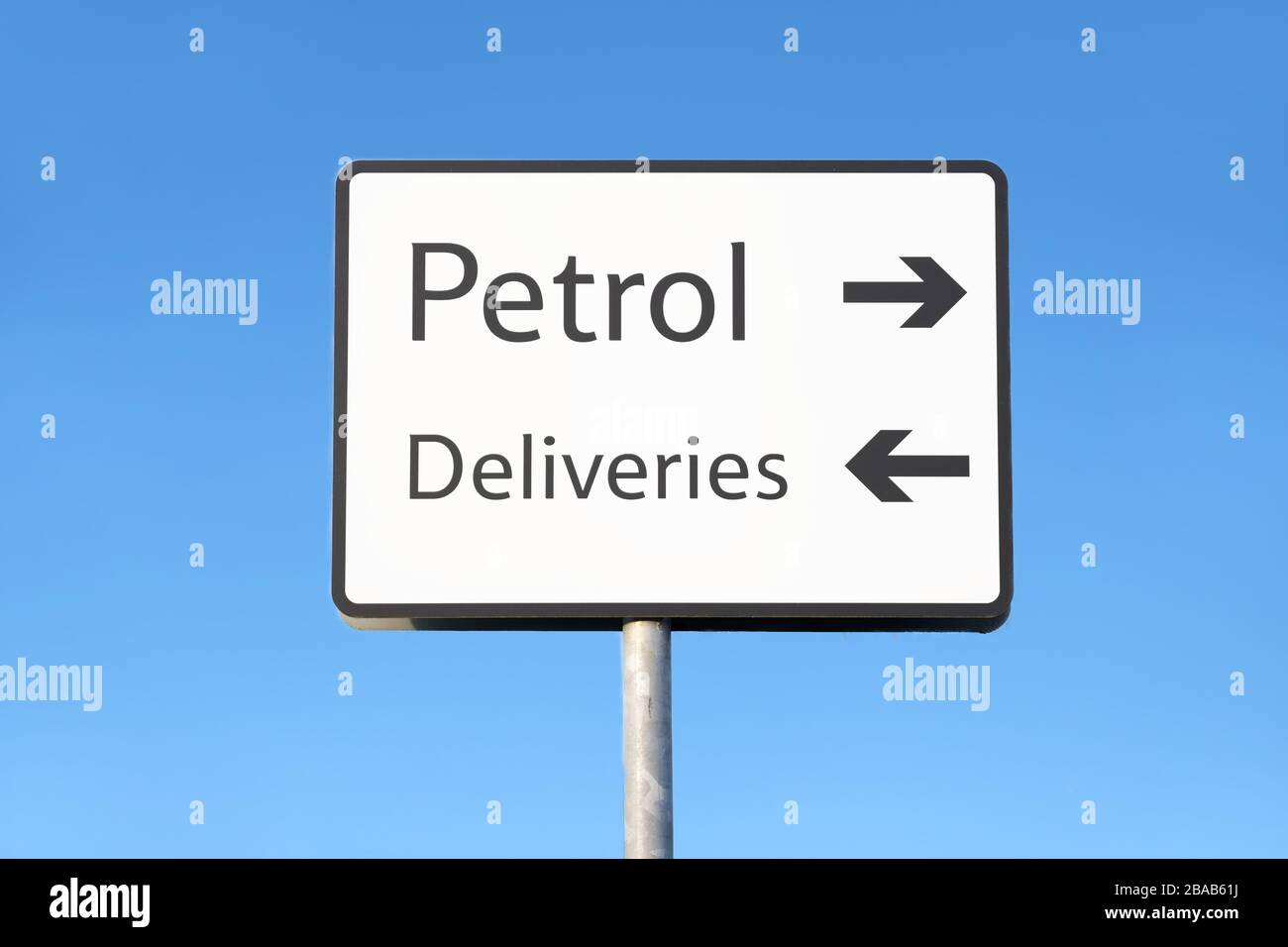 Petrol delivery exit direction arrow sign Stock Photo - Alamy