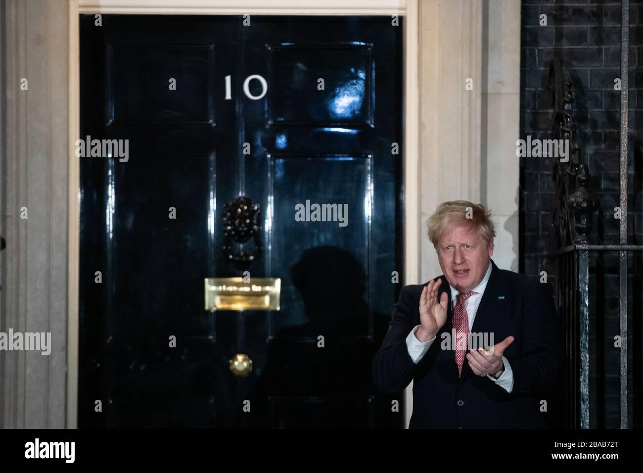 Prime Minister Boris Johnson outside 10 Downing Street, London, joining ...