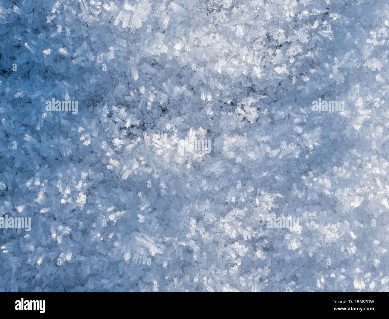 Surface of ice crystals on snow Stock Photo - Alamy