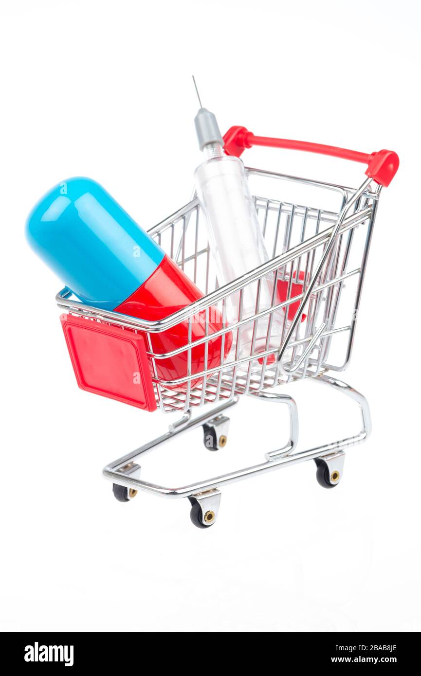 Healthcare shopping cart carrying hypodermic vaccine needle and large ...