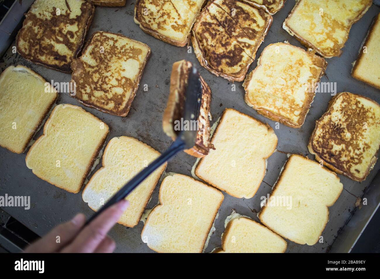 Flipping egg hi-res stock photography and images - Alamy