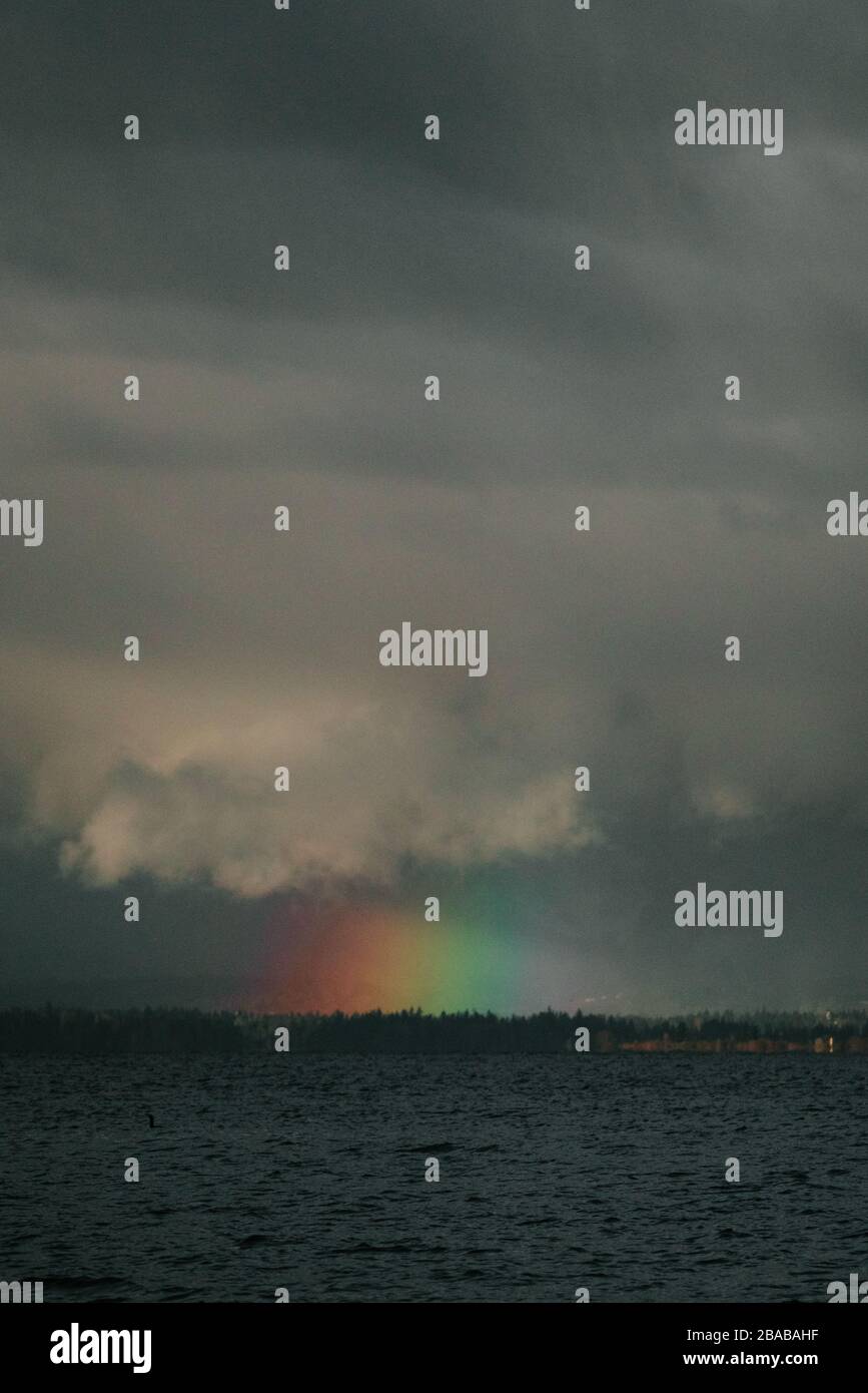 A full spectrum rainbow above the Puget Sound in Washington State Stock ...