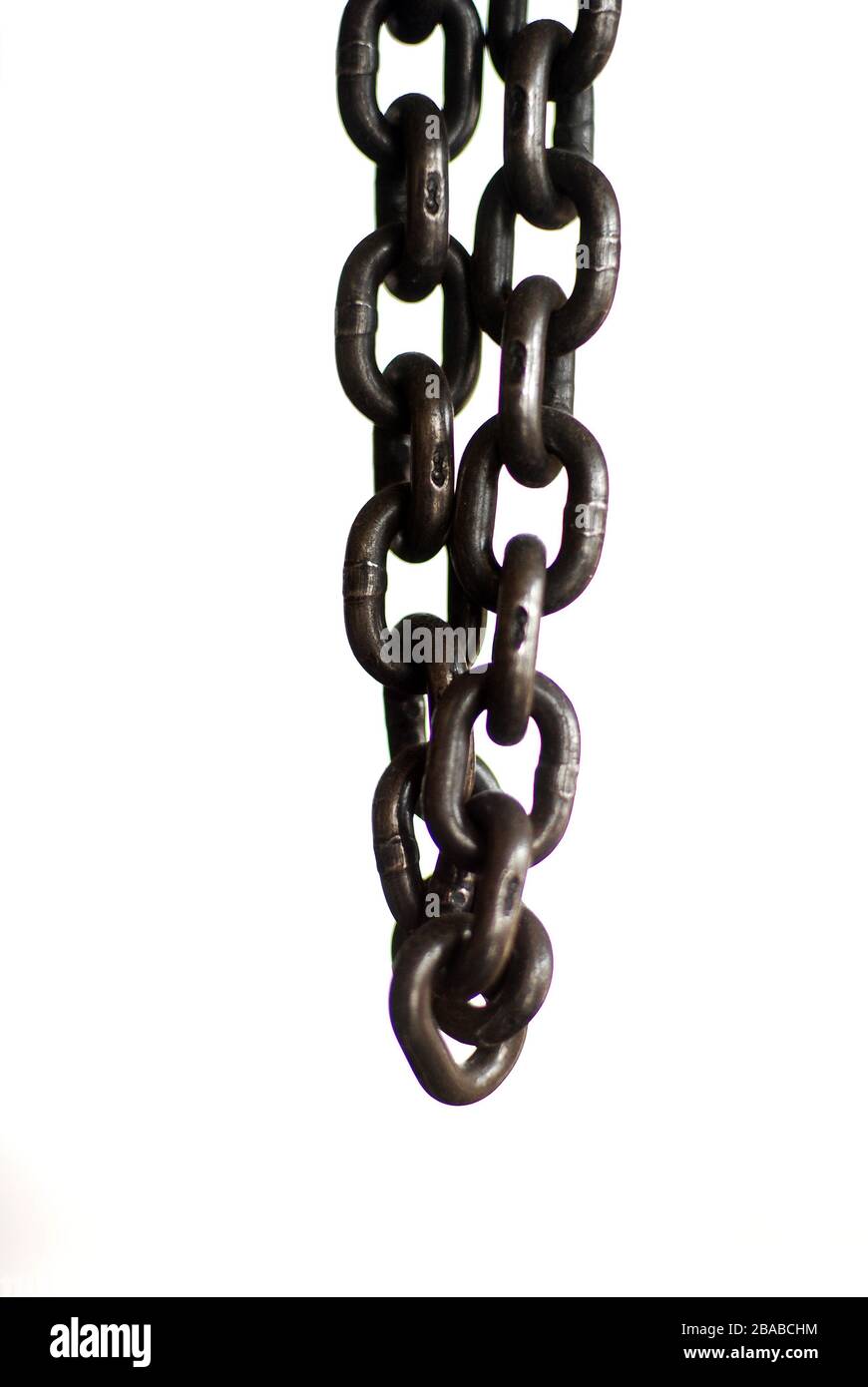 Heavy iron chain isolated vertical close up Stock Photo - Alamy