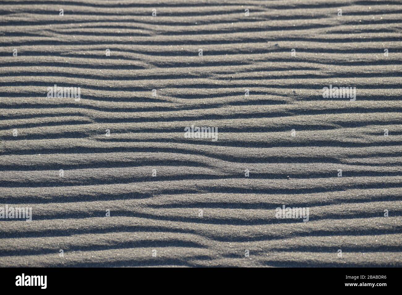 The horizontal rippled texture of sand dunes at the beach Stock Photo ...