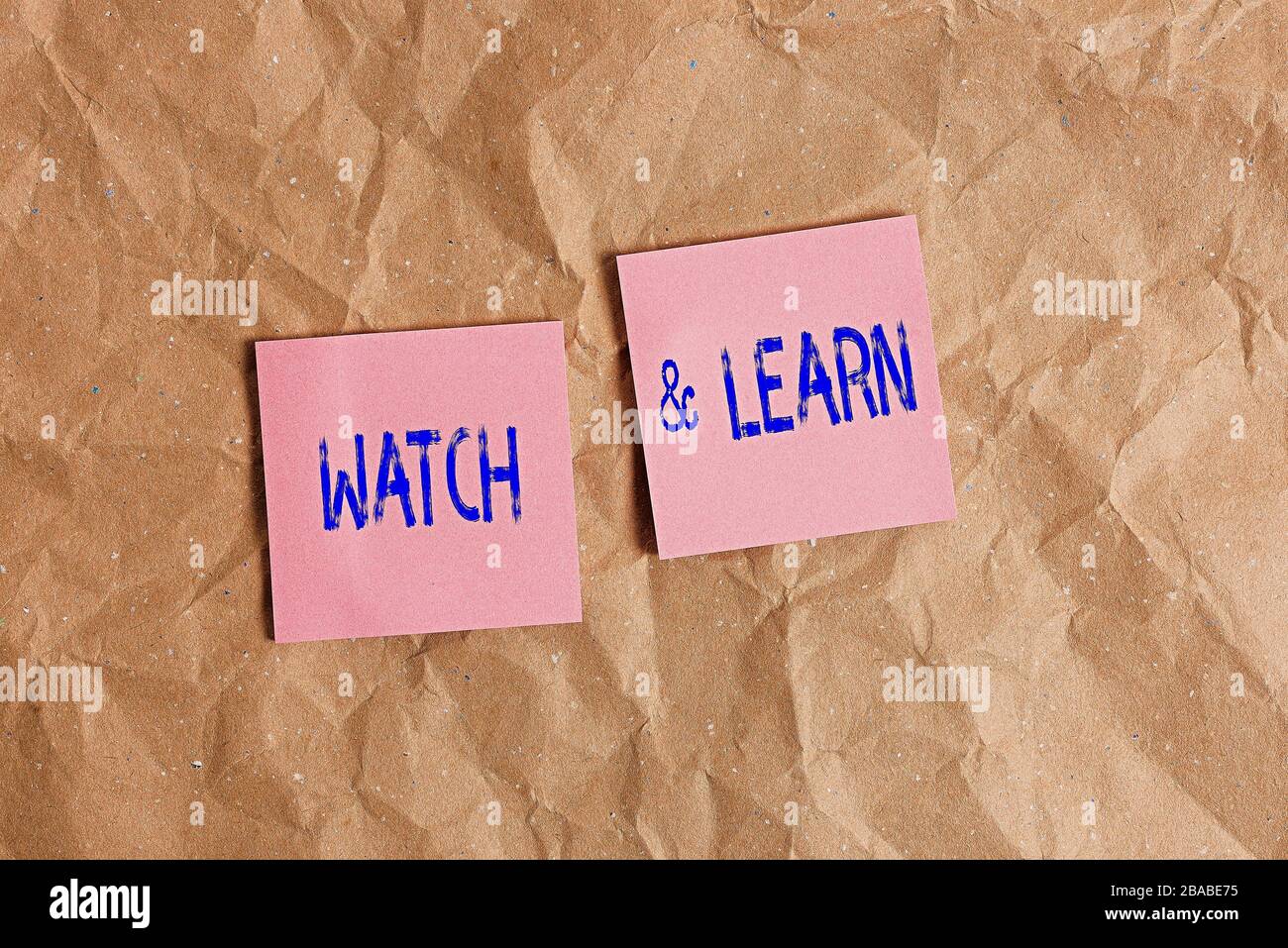 Writing note showing Watch And Learn. Business concept for ...