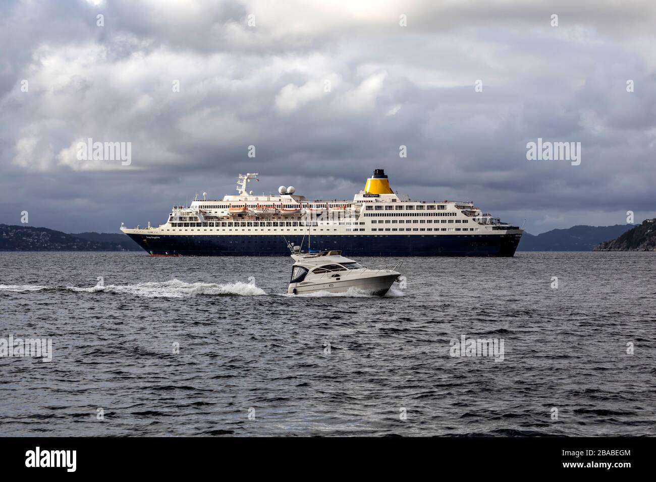 Small pleasure craft Peace, at Byfjorden outside port of Bergen, Norway ...