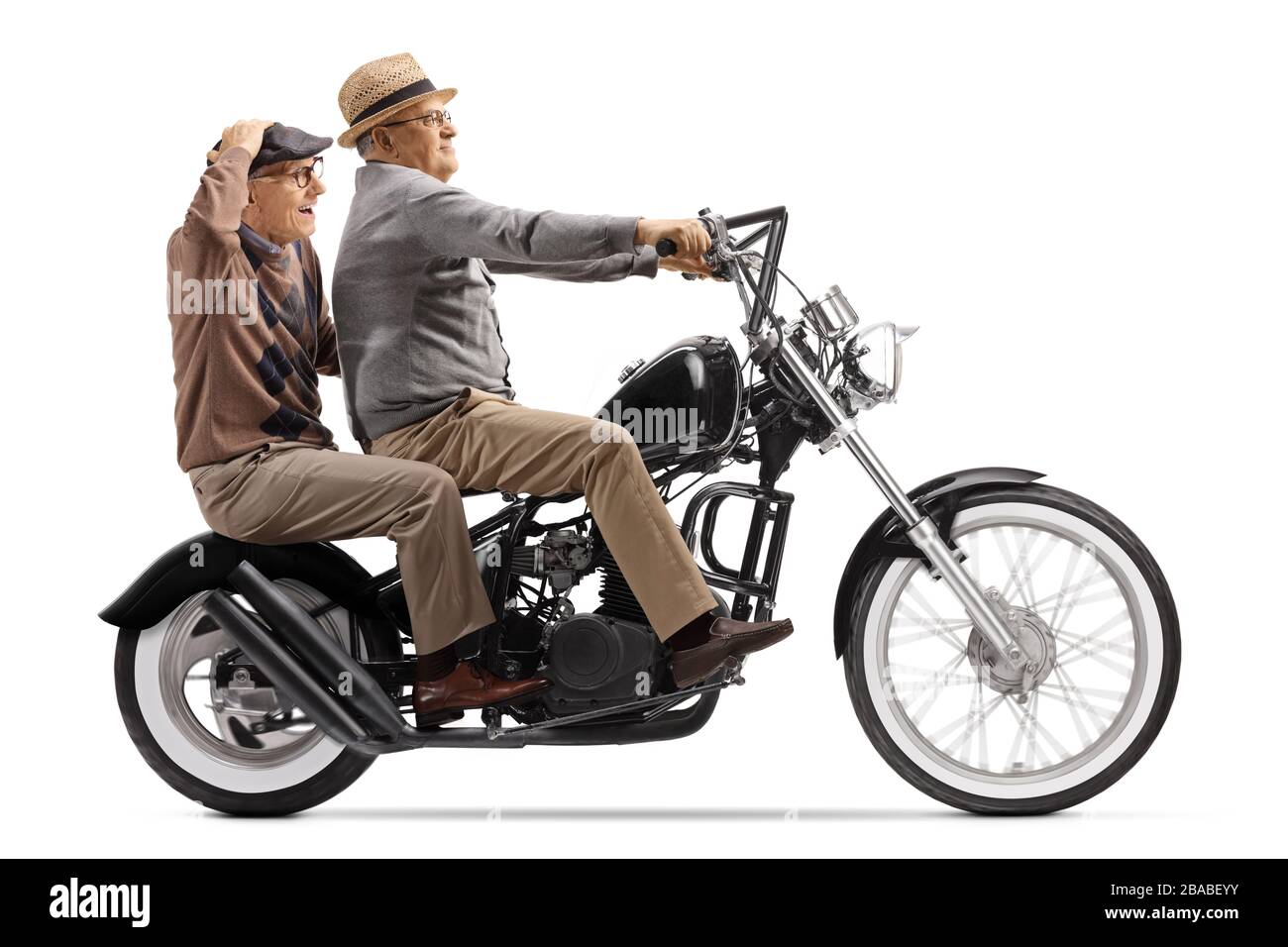 Elderly men riding on a custom chopper isolated on white background ...