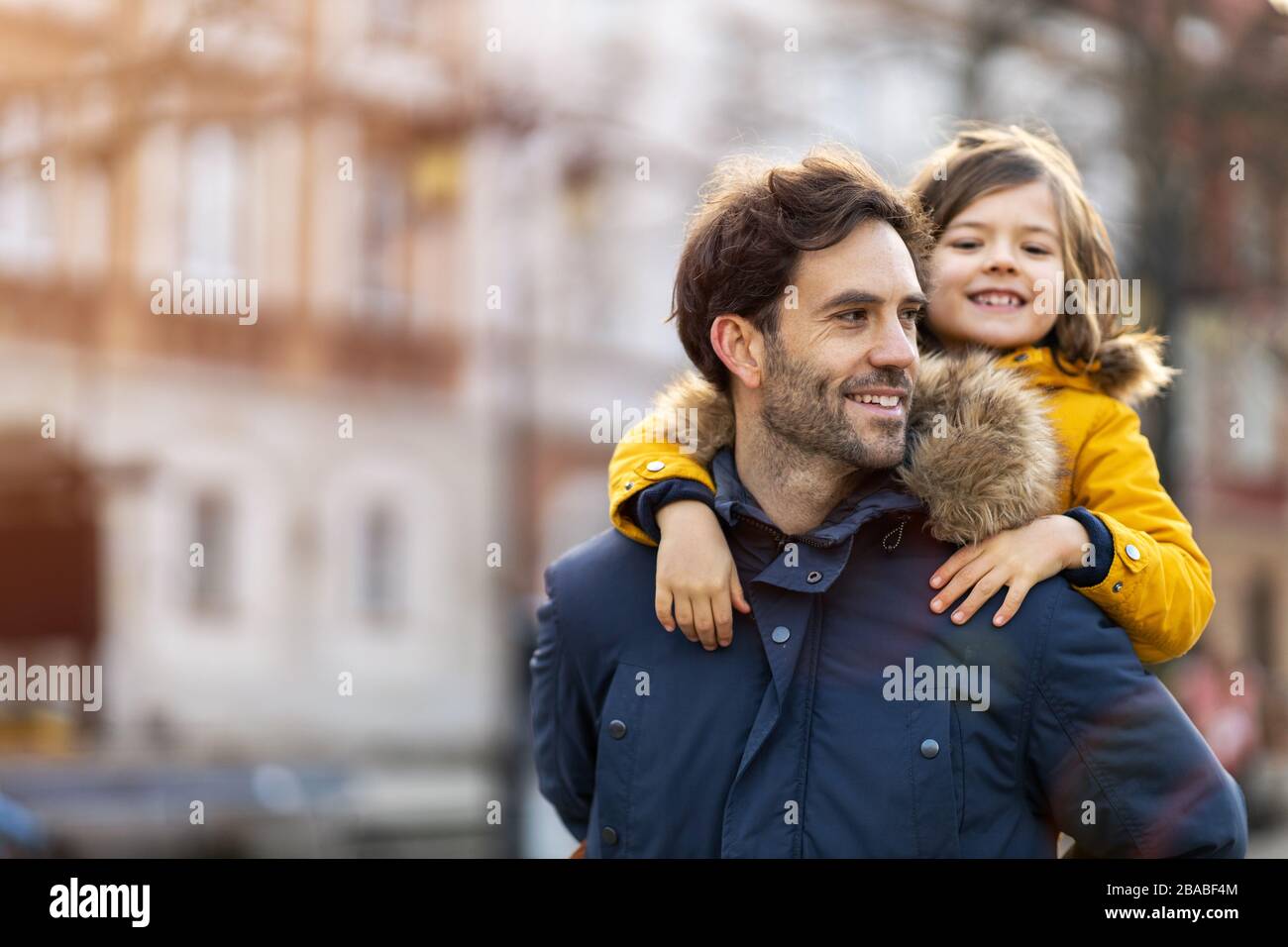 Kids hugging dad hi-res stock photography and images - Alamy