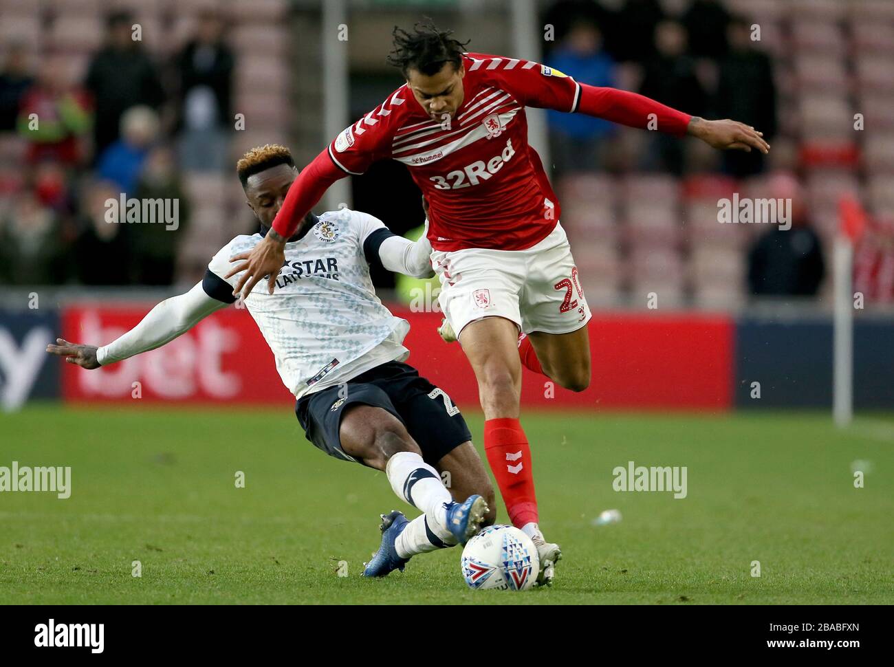 Luton Town's Kazenga LuaLua (left) and Middlesbrough's Lukas Nmecha ...