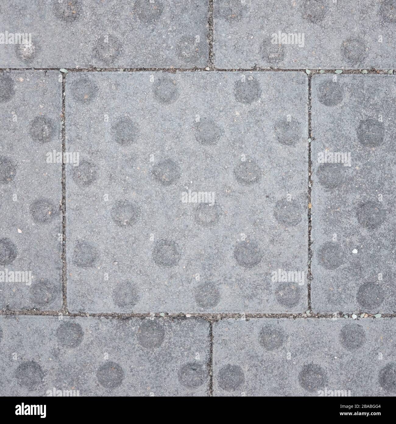 social distance - stone tiles with bumps Stock Photo - Alamy