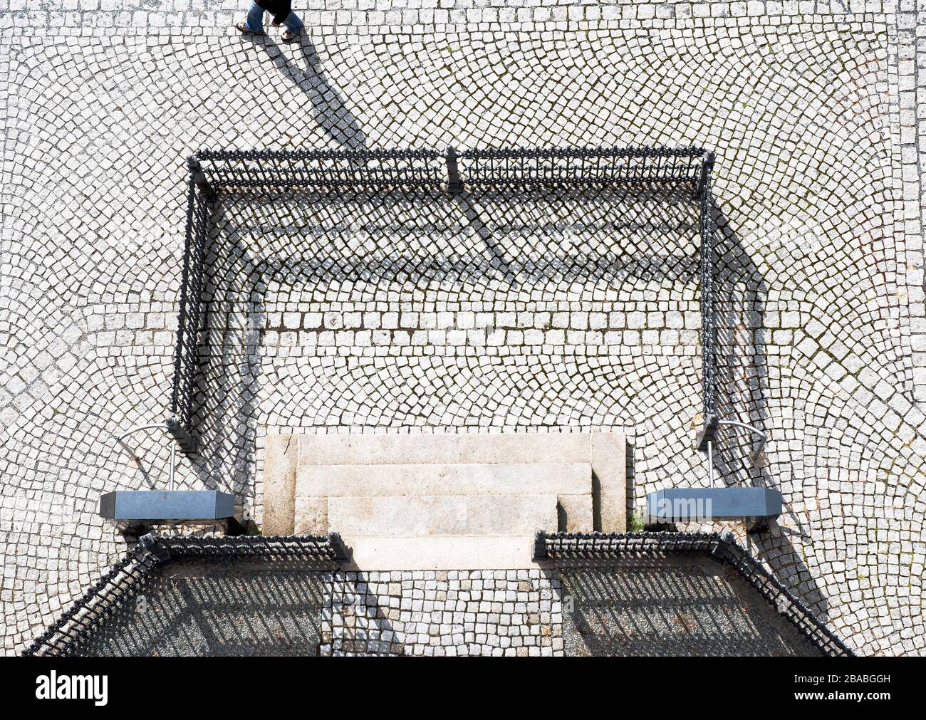 Aerial view from a tower, texture of a place and shadow of a person ...