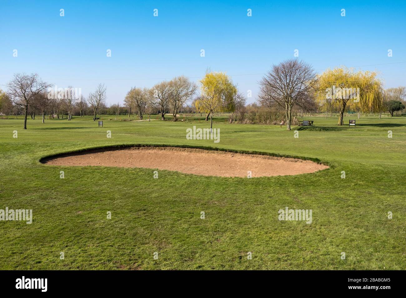 Big sand trap bunker on a golf course Stock Photo - Alamy