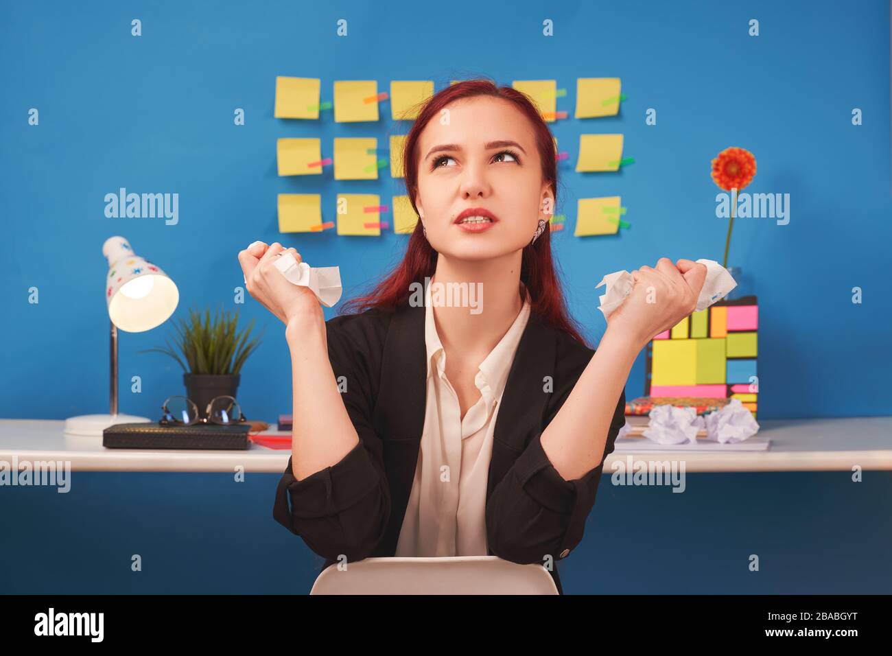 Woman has an angry expression, no creative ideas Stock Photo - Alamy
