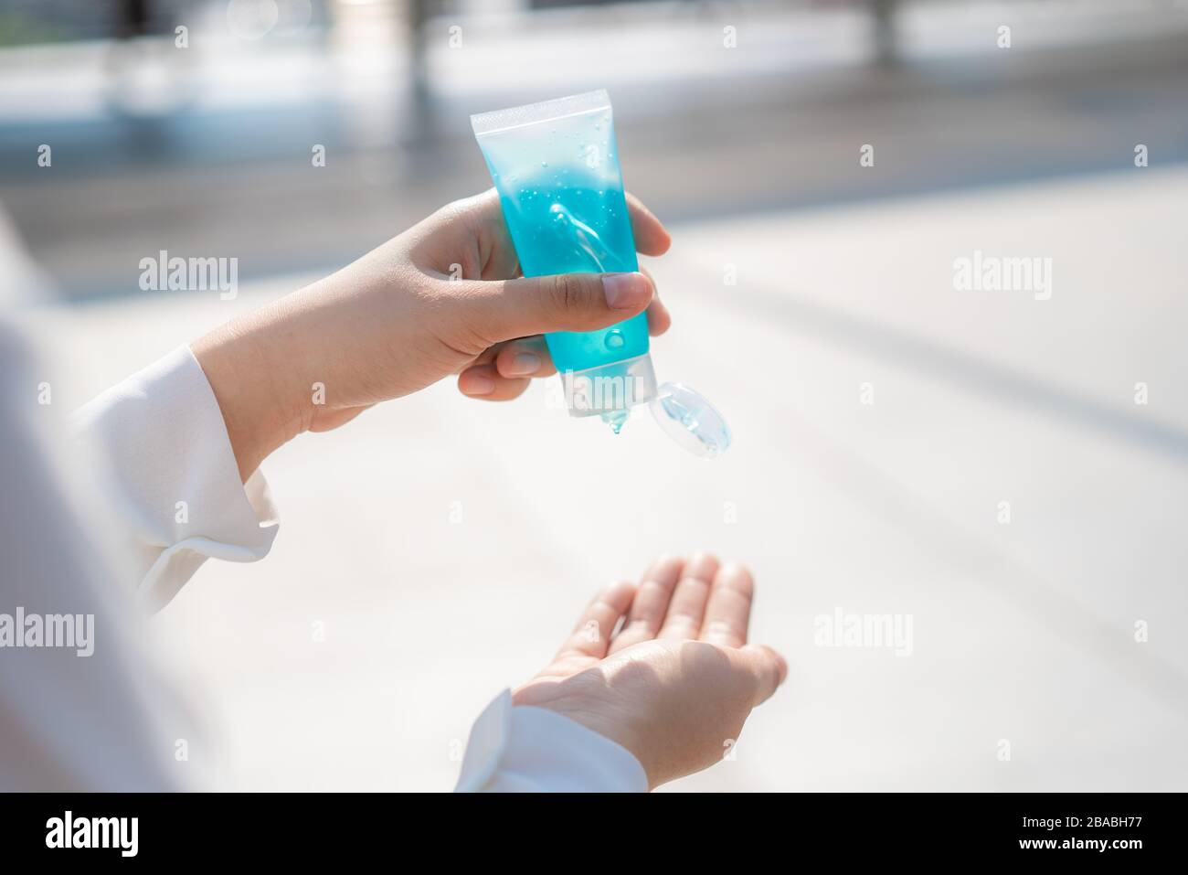 Close up of woman hand using alcohol antiseptic gel, prevention ...