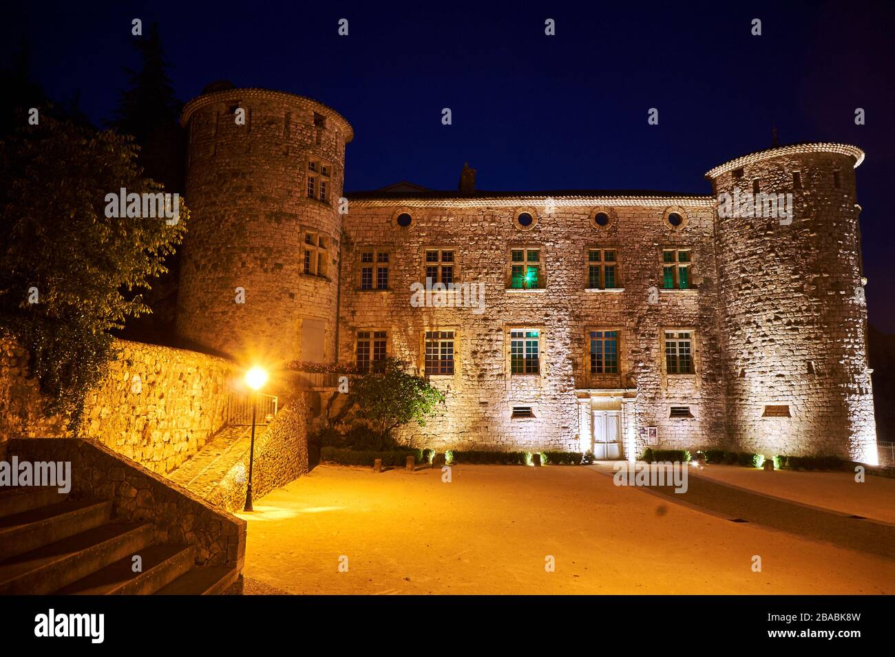 Towers of medieval stone castle at night in Vogue in France Stock Photo ...