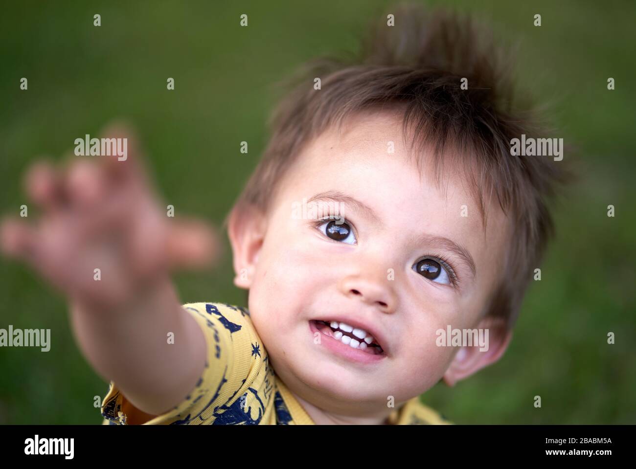 Child reaching hi-res stock photography and images - Alamy