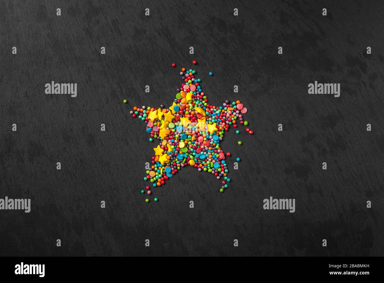 Sprinkle star shape background. Sprinkle in the form of stripes, balls ...