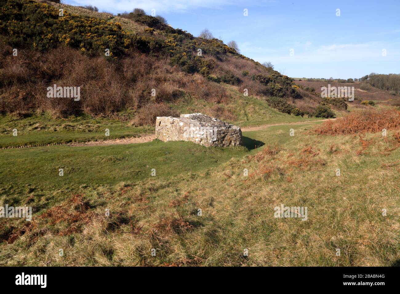 A remote stone built lookout post in the base of a valley discretely ...