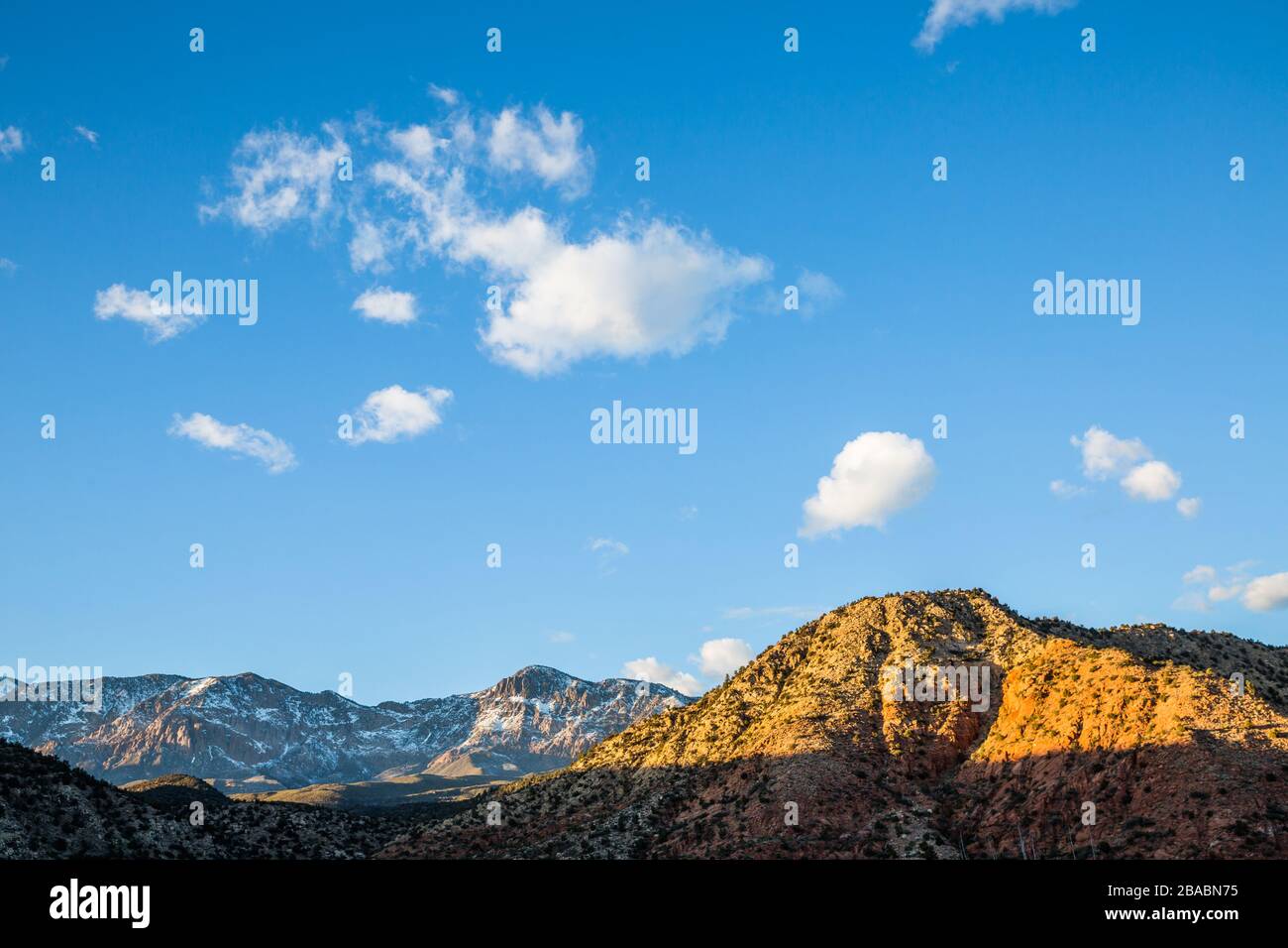 High above the desert of St. George, Utah, the snowy Pine Valley ...