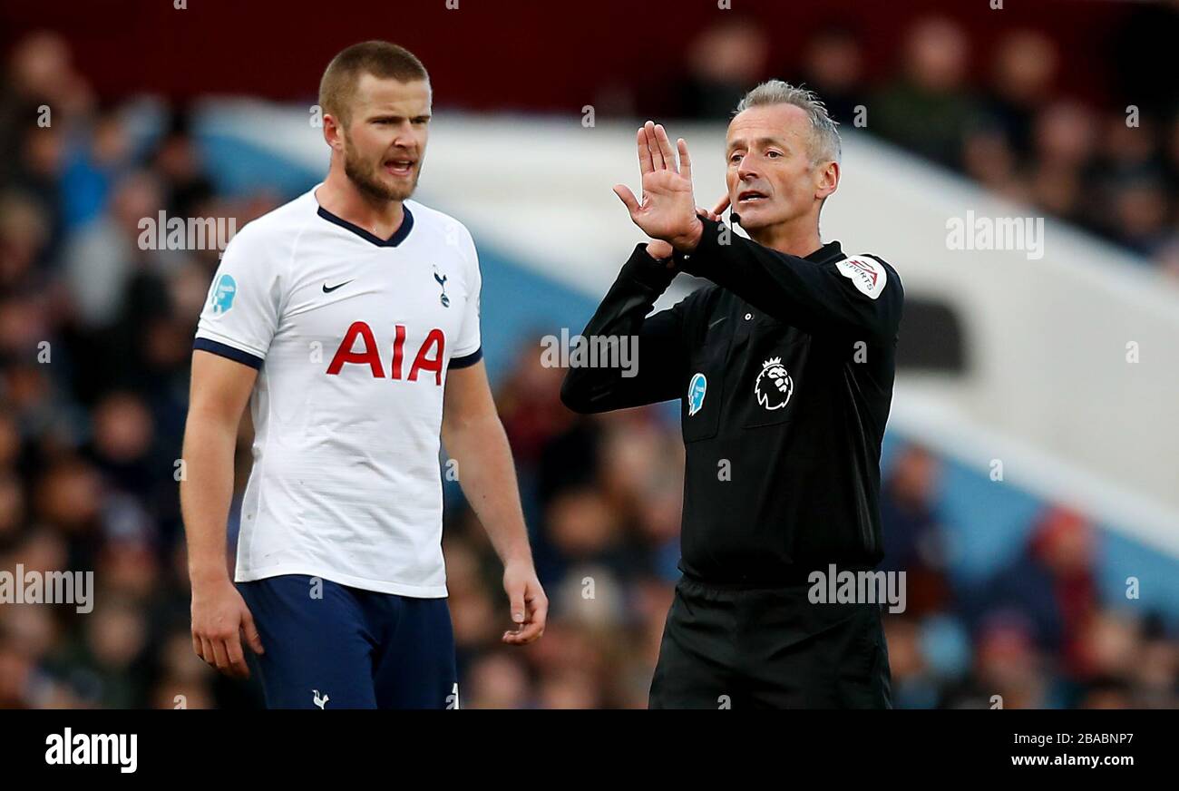 Referee Martin Atkinson and Tottenham Hotspur's Eric Dier (left Stock ...