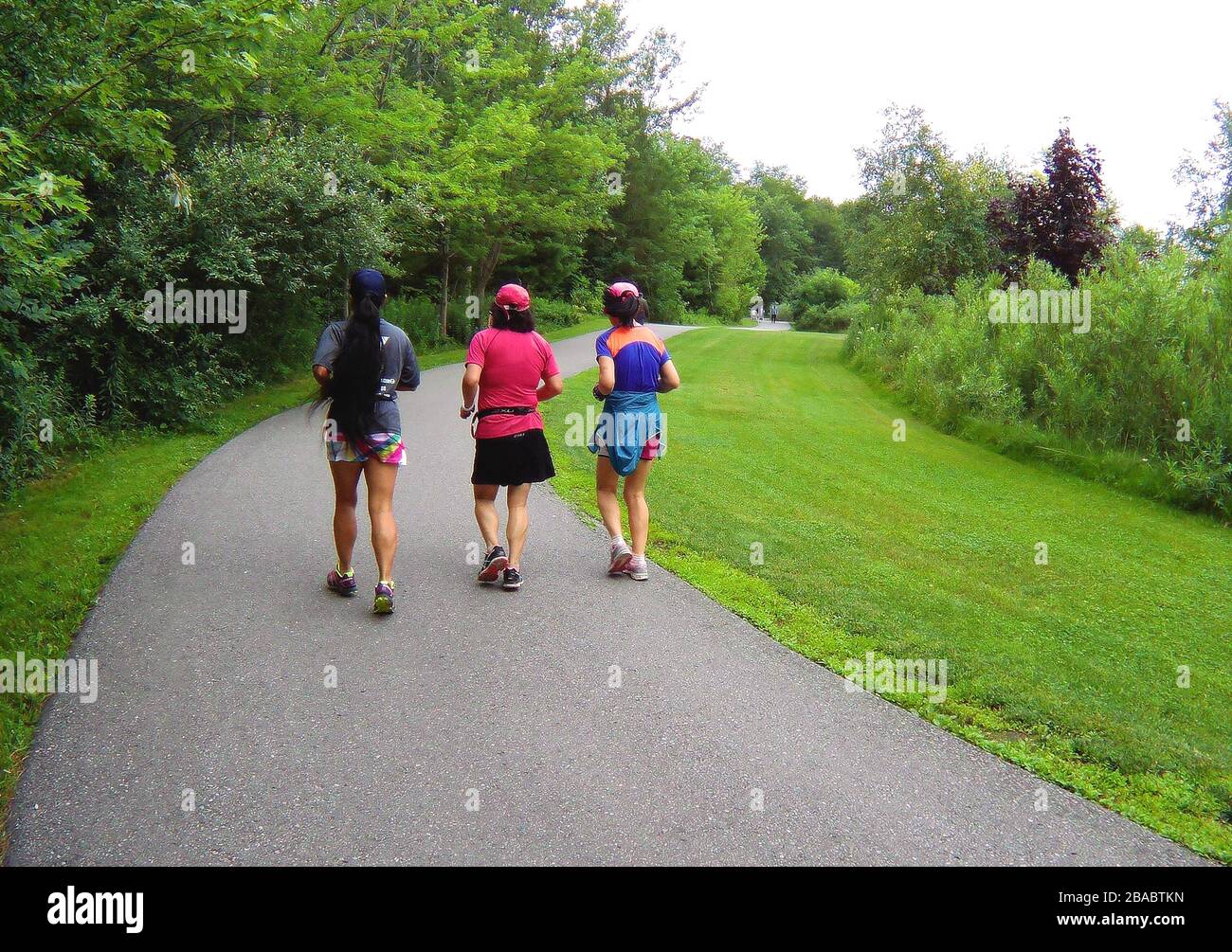 Walking in the public park - a healthy lifestyle Stock Photo - Alamy