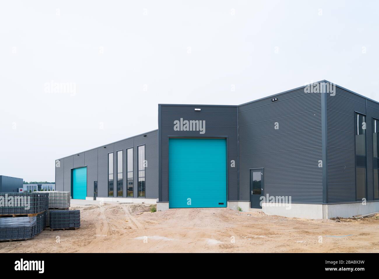 exterior of a new commercial warehouse under construction Stock Photo ...
