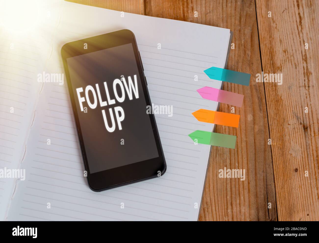 Writing note showing Follow Up. Business concept for a continuation of ...