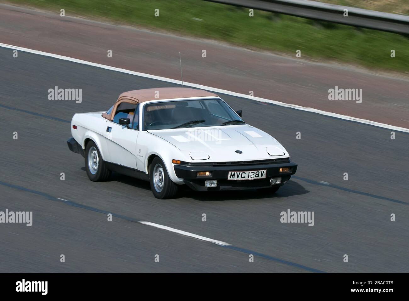 MVC128V 1980 Triumph TR7 White car Petrol driving on the M6 motorway ...