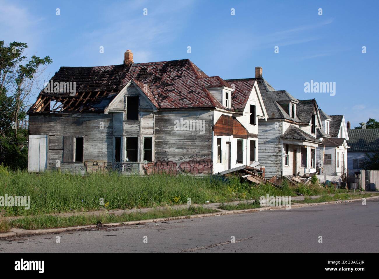 Row of abandoned and burned-out dwellings, Westside, Detroit, Michigan ...