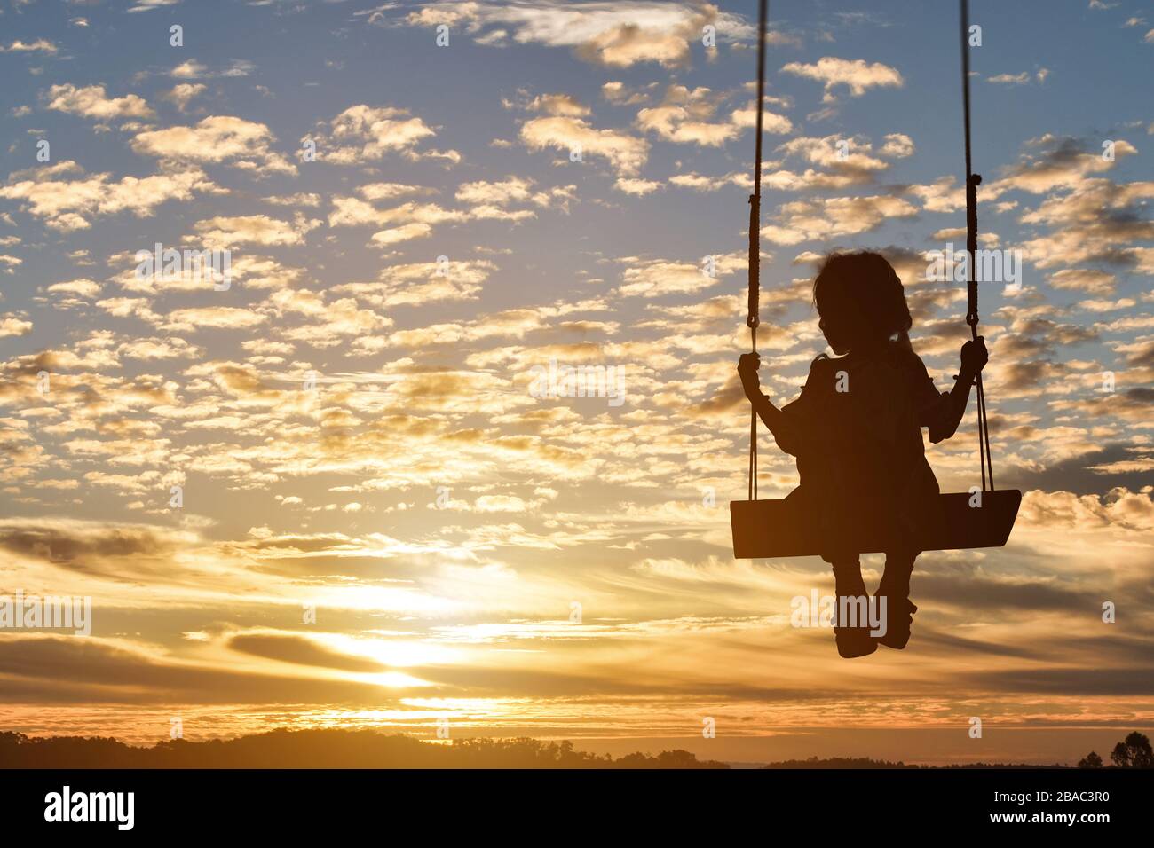 Girl swing silhouette hi-res stock photography and images - Alamy